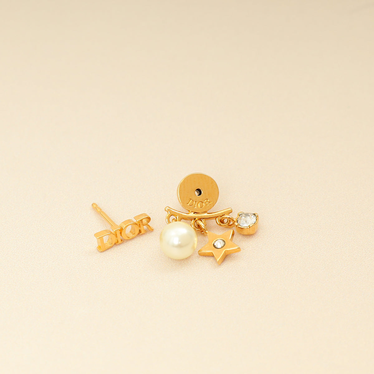 Christian Dior Gold Finish Dio(r)evolution Earrings – THE CLOSET