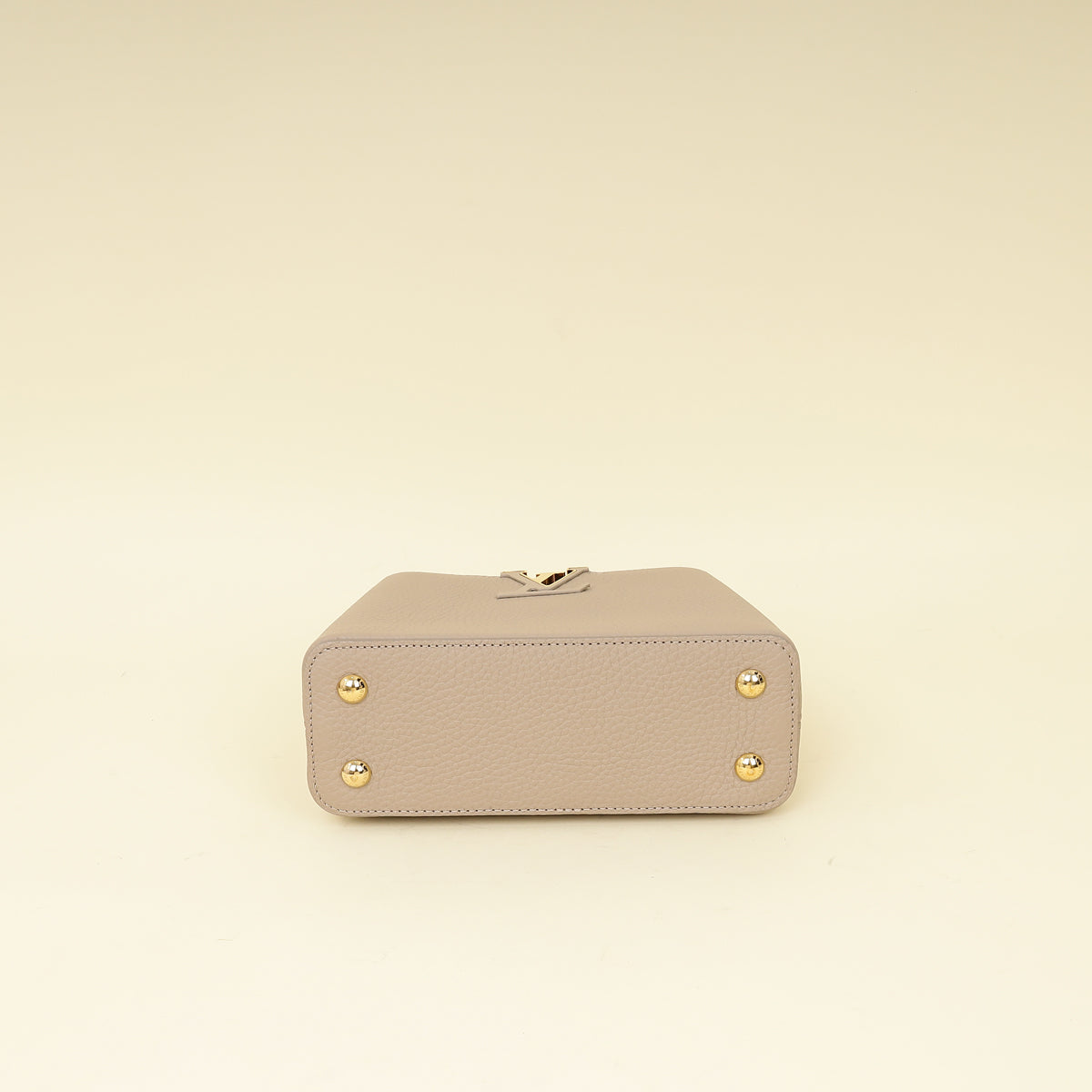 Louis Vuitton Galet Grey Mini Capucines Bag – THE CLOSET