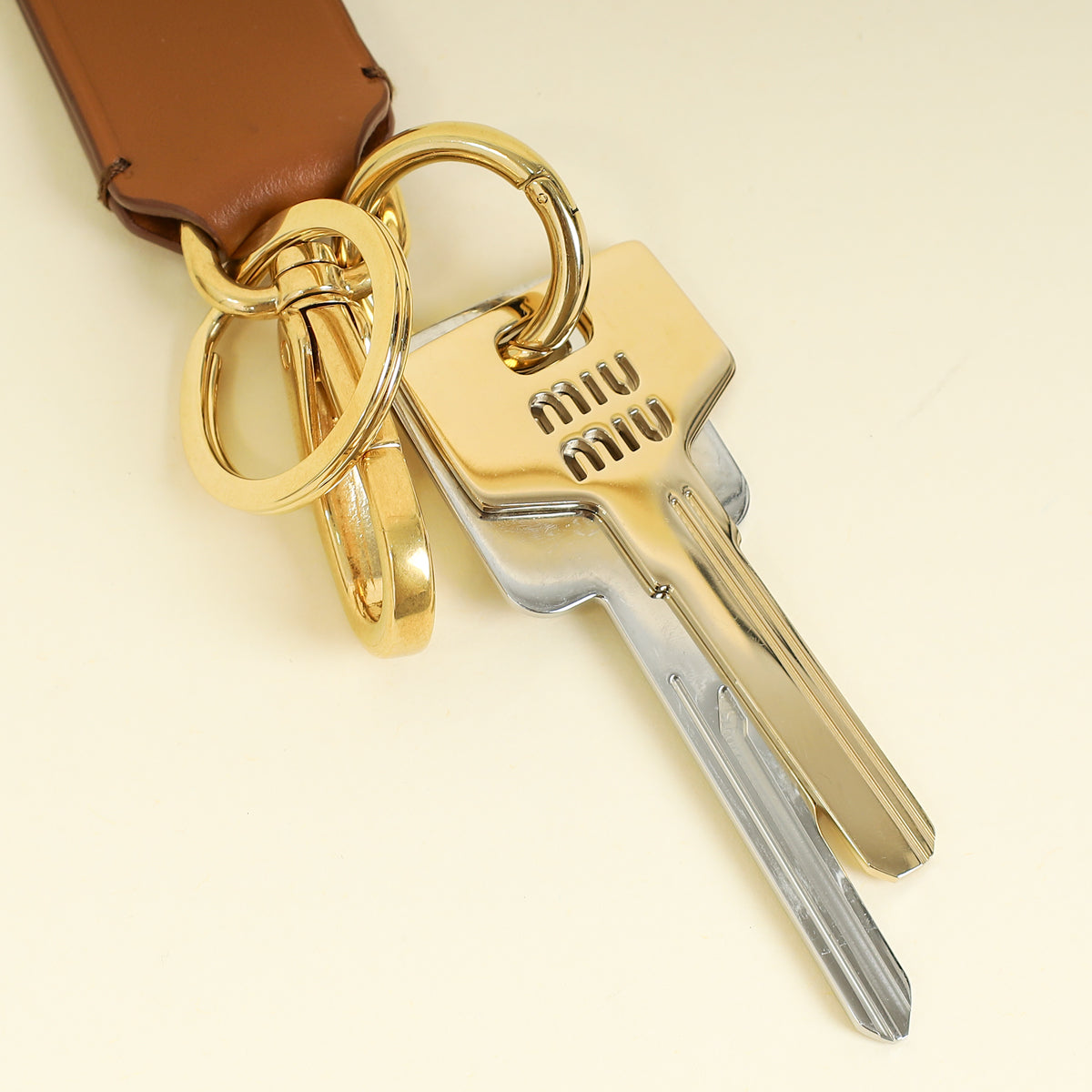Miu Miu Cognac Buckle Keyring | Pre-Owned The Closet UAE – THE CLOSET